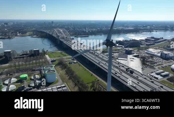 wind turbine at van Brienenoordbrug, bridge in Rotterdam, south Holland ...