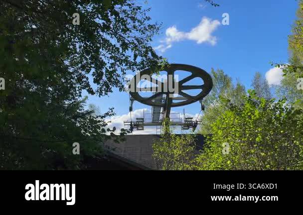 Funicular mechanism with one rotating wheel in mountains. High quality ...