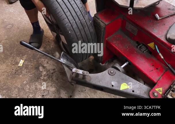 Steps to replace a tire using specialized machinery showcasing tire ...