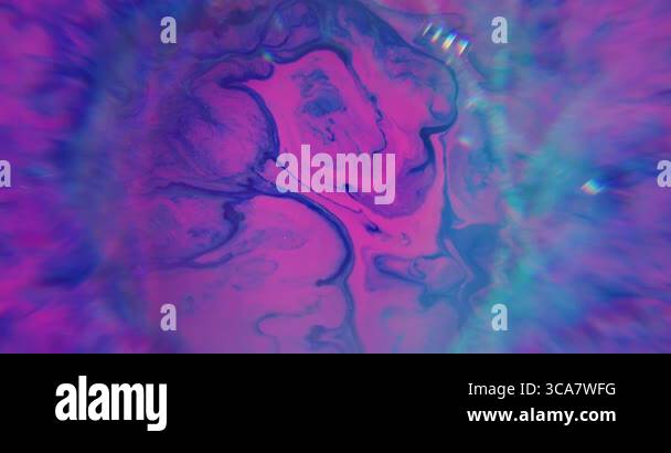 Defocused shiny emulsion. Prism fluid. Neon color purple violet pink ...