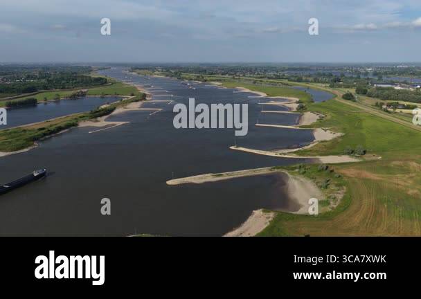 Waal river, water way, transport and logistics over water. Aerial drone ...