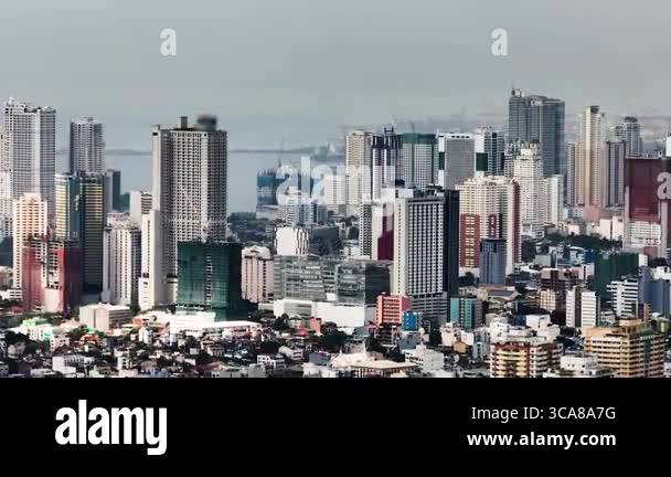 Business office buildings and high rise towers in Makati. Blue sky and ...