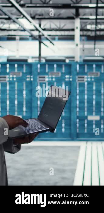 Vertical video Data center developer writing code for resource ...