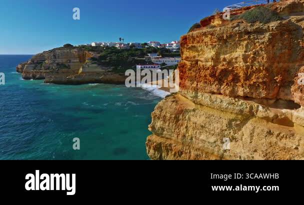 Aerial view of coastal caves in Algarve, Portugal. Rock formations and ...