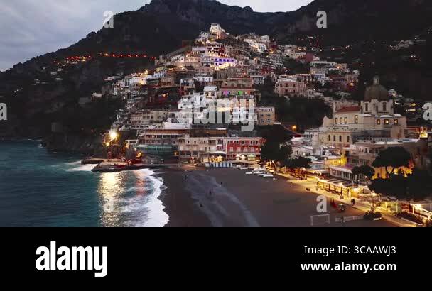 Aerial view of Positano. The famous colorful houses at night with light ...