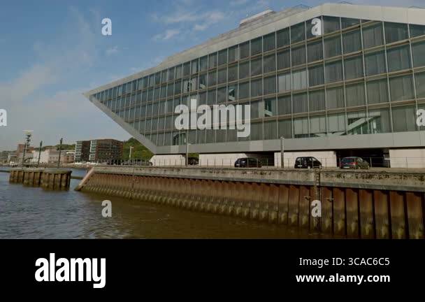 HAMBURG, GERMANY - SEPTEMBER 23 2024: Dockland office building of ...
