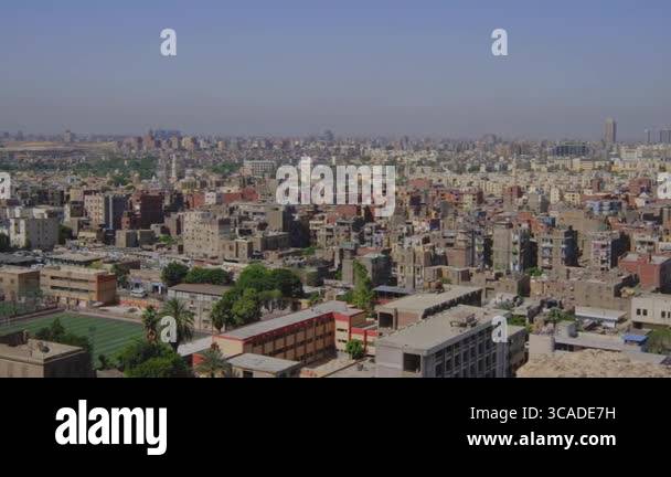 A high-resolution 4K video still of Cairo, Egypt, showcasing a vast ...