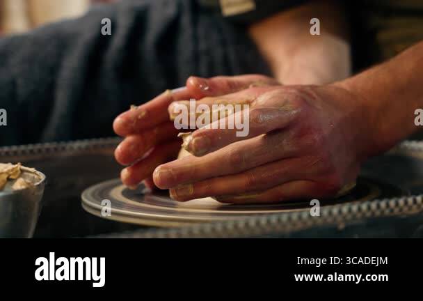 Close up hands master man handicraft male craftsman create new vase jug ...