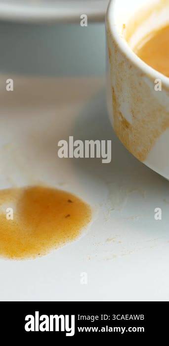 Spill of food on a clean white table at a cafe Stock Video Footage - Alamy