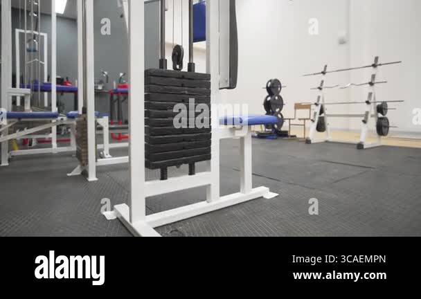 Lat pulldown machine stands with solid frame adjustable seat and ...