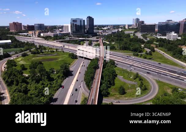 Skyscrapers, highway and subway station. The camera moves along the ...