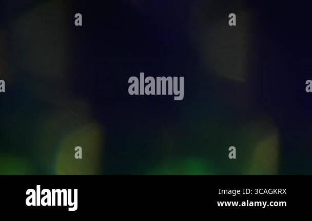 Beam leak. Blur light glint. Defocused yellow green blue colorful ...