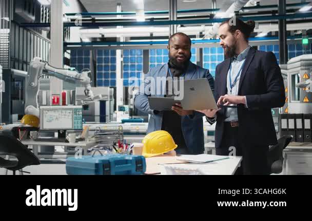 Team of diverse analysts consultants reviewing data and checklists in a ...