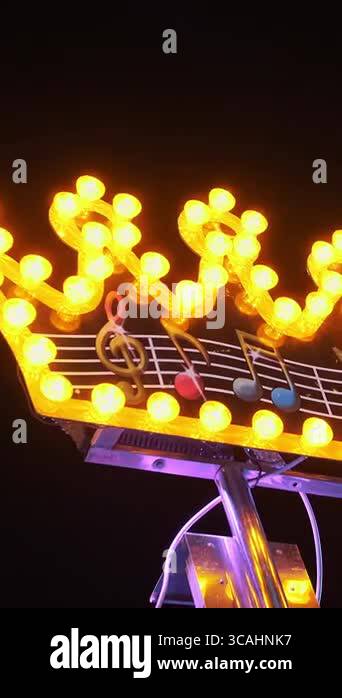 Crown. Flashing lights.Fun Fair at Night. Amusement Park Lights at ...