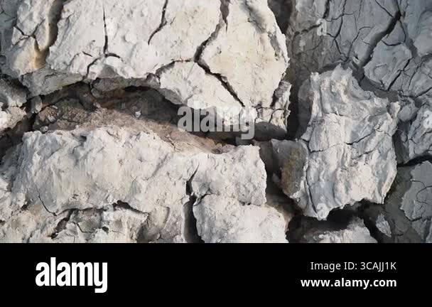 Cracked ground displays the impact of drought and changing climate ...