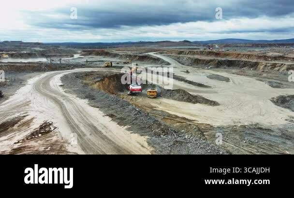 Mining operations extracting minerals in open pit mine Stock Video ...