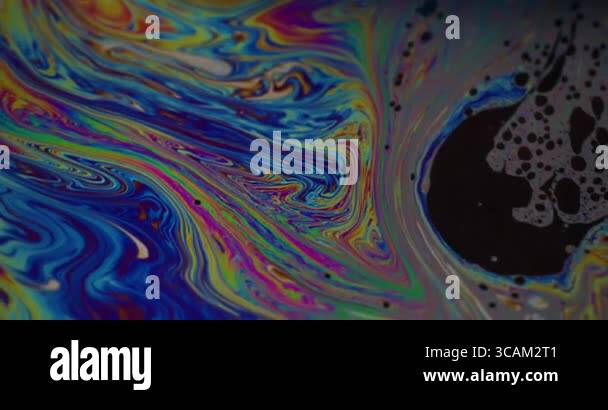 Paint drop. Stains art. Defocused blue yellow purple color flowing ...