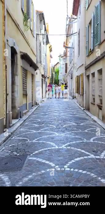 Antibes, France - August 29, 2024: People walking on the streets of the ...