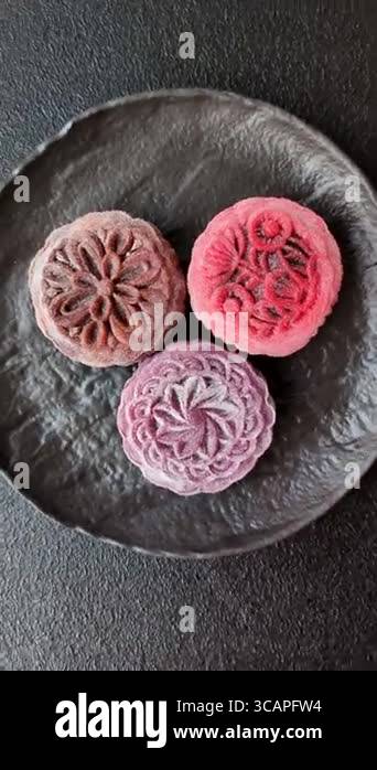 Chinese mooncake is an Asian sweet dessert with a coating of rice dough ...