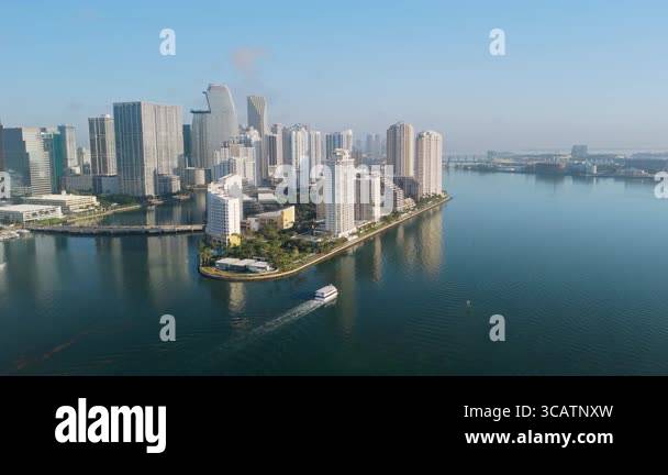 Sunrise over Miami South Channel and downtown skyline. Aerial footage ...