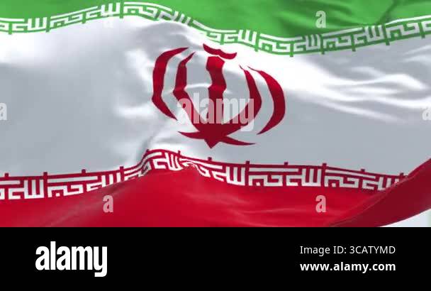 Close-up of Iranian flag with red, white, and green colors fluttering ...