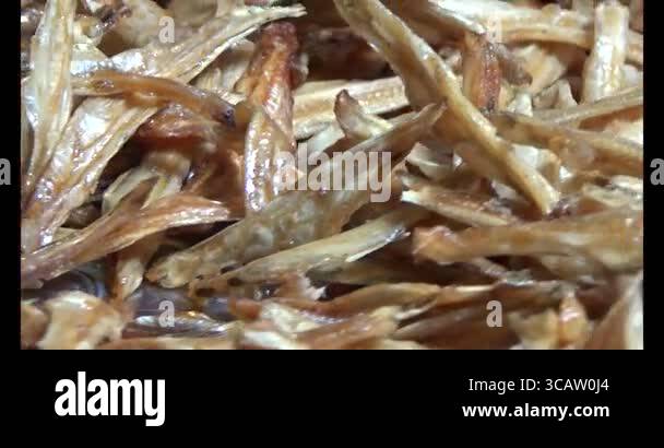 the fried dried fish Stock Video Footage - Alamy