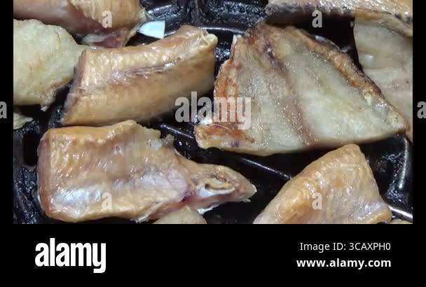 The Grilled dried fish Stock Video Footage - Alamy