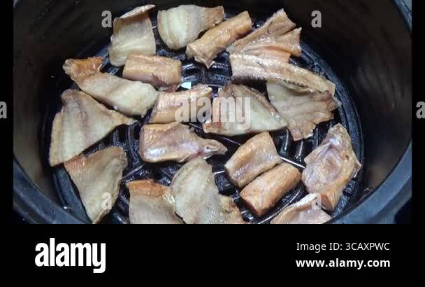 Grilled dried the fish Stock Video Footage - Alamy