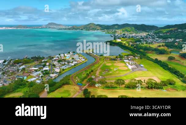 Beautiful golf course surrounded by residential area. Drone flight ...