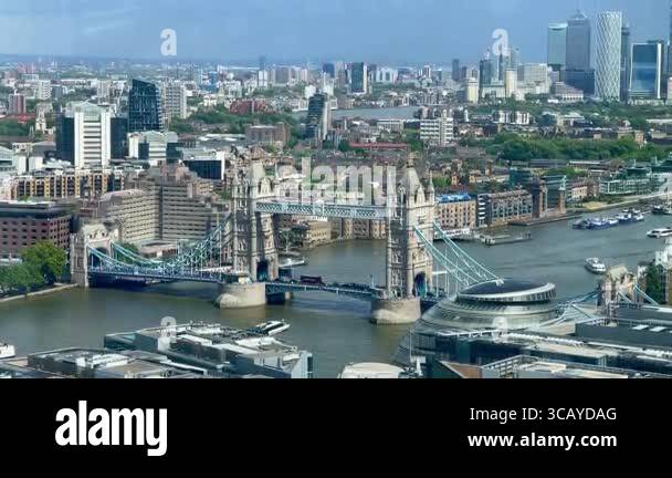Panoramic aerial view of Tower Bridge and the River Thames surrounded ...