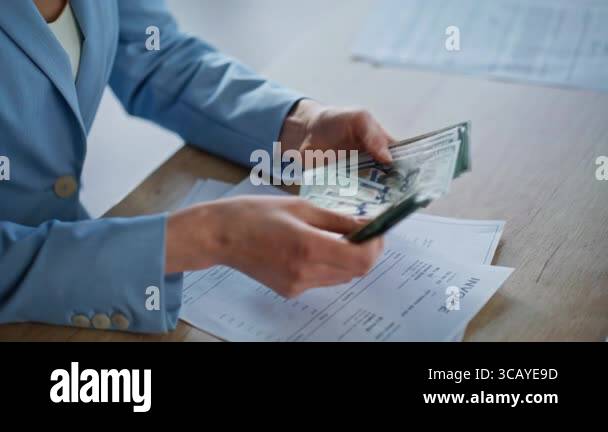 Businesswoman hands counting US dollars at wooden desk closeup. Unknown ...