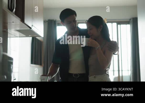 Morning intimacy between loving partners, sipping coffee and sharing ...