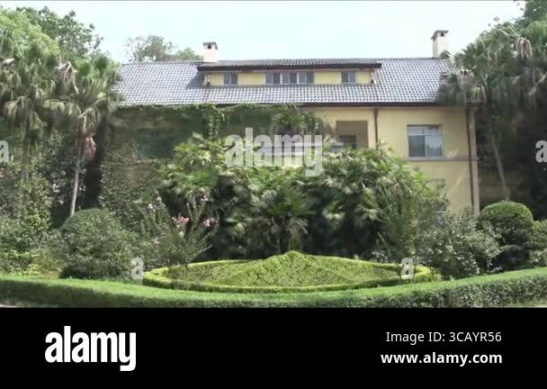 A two-story building, gradually zooming in the camera lens Stock Video ...