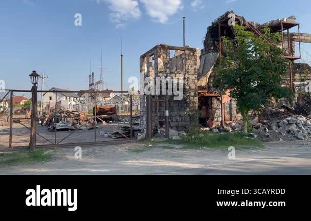 Post war urban scene showing a devastated street with ruined buildings ...