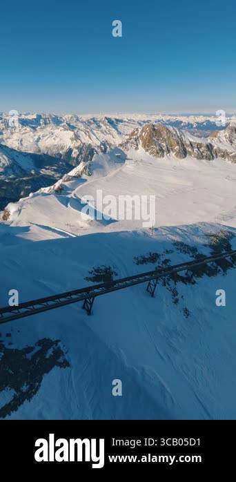 Vertical panoramic view from Kitzsteinhorn peak overlooking Kaprun ...