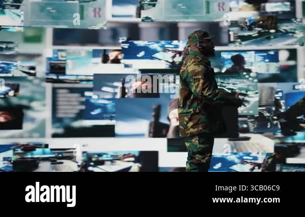 Black veteran reviewing battlefield data in a high tech command center ...