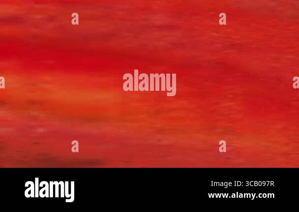 Vibrant red hues paint an abstract background with a textured gradient ...