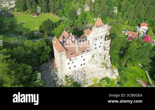 An aerial view overlooking Bran Castle in Romania, also known as ...