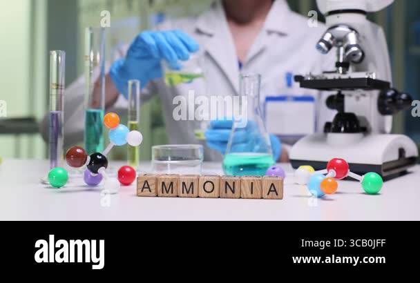 In a laboratory setting, a scientist performs experiments with ammonia ...