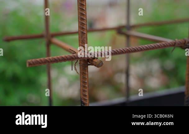 Rusty metal rebar tied with wire, close-up. High quality FullHD footage ...