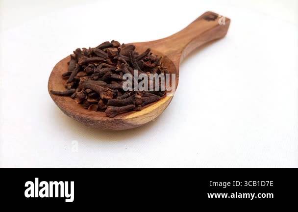 Whole cloves in spoon Stock Videos & Footage - HD and 4K Video Clips ...