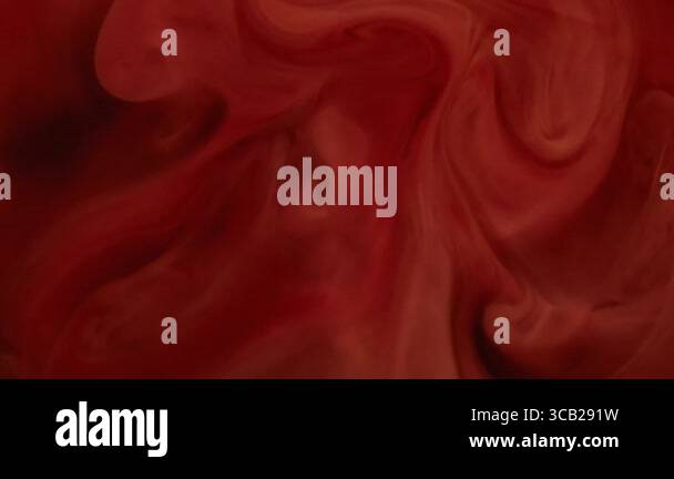 Fume particles. Paint mix. Defocused red crimson color water texture ...