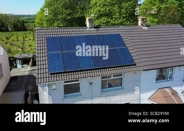 Aerial drone footage of a British semi detached house with energy ...