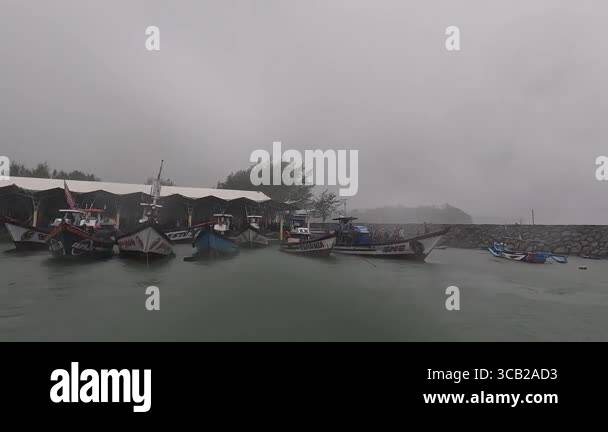 The port was hit by storms and big waves during heavy rain Stock Video ...