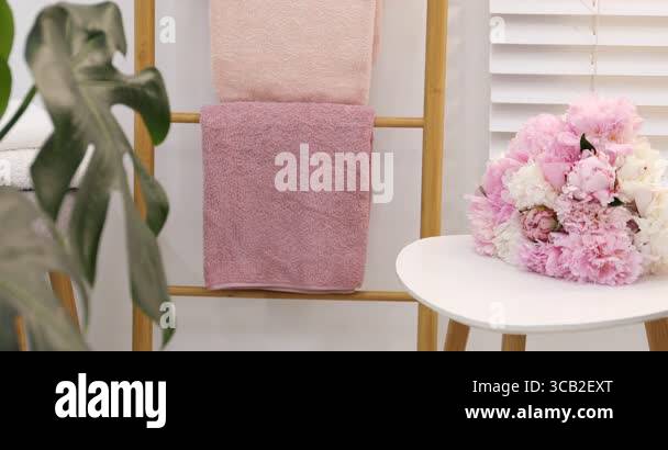 Woman putting soft towel onto table in bathroom, closeup Stock Video ...