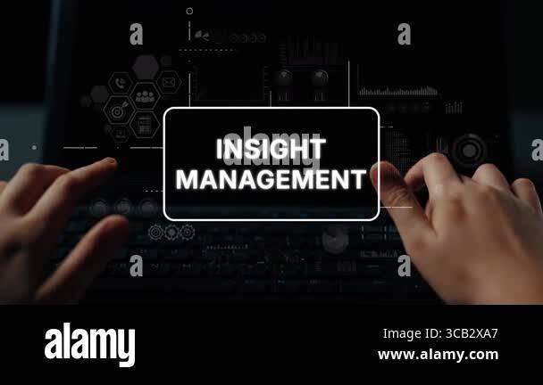 Digital workspace with hands on laptop showcasing insight management ...