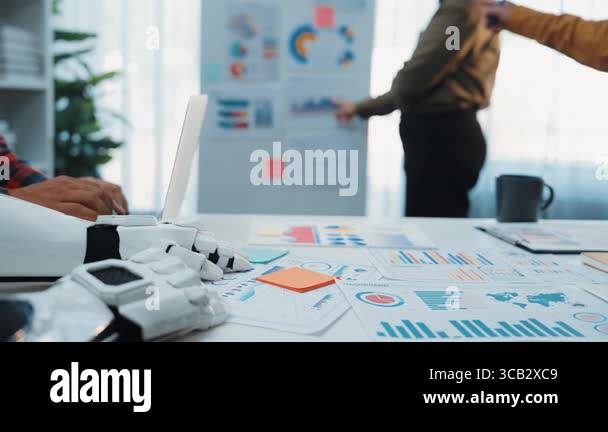 Business professionals engaging with AI-driven technology for data analytics and decision-making ...