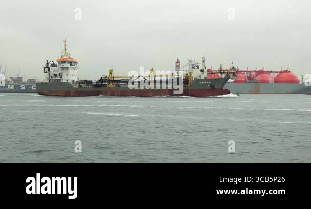 Rotterdam, The Netherlands - September 19, 2019: Dredging ship sailing ...