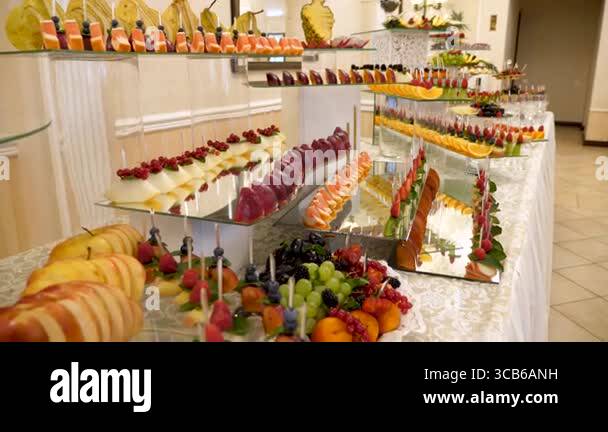Beautiful sweet buffet with fruits and berries. Fruit table Stock Video ...