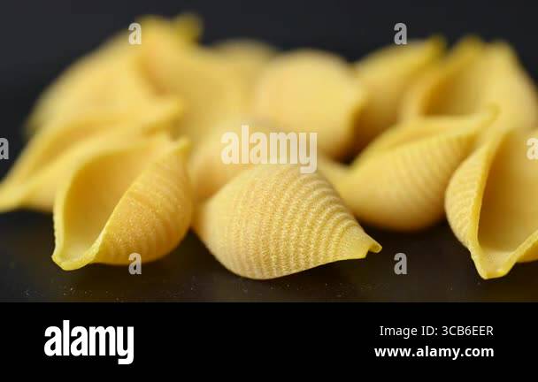 video colored pasta shells close up Stock Video Footage - Alamy